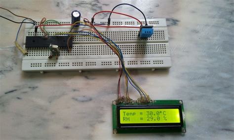 interfacing dht11 sensor with pic16f877a ccs c compiler