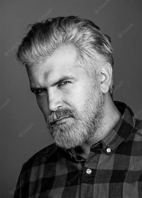 Premium Photo Mature Blonde Bearded Guy With Trendy Hairdo In Casual