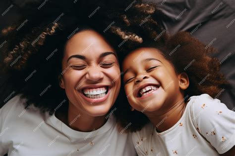 Premium Ai Image Top View Of A Mother And Her Daughter Laughing