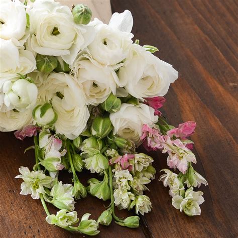 Iron And Twine Ranunculus And Larkspur Flower Arrangement