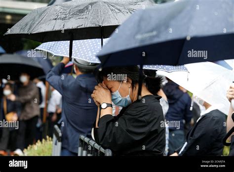 A Woman Mourns As The Hearse Carrying Late Seoul Mayor Park Won Soon