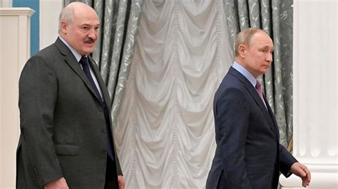 Belarus President Lukashenko Appears To Stand In Front Of Map Of