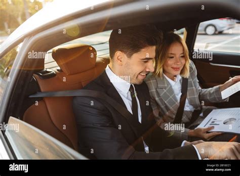 Image Of Young Caucasian Businesslike Man And Woman In Formal Wear