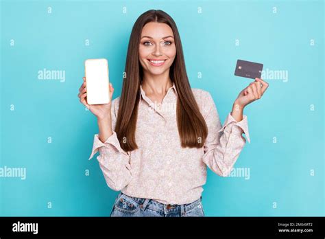 Photo Of Impressed Millennial Woman Show Telephone Card Wear White