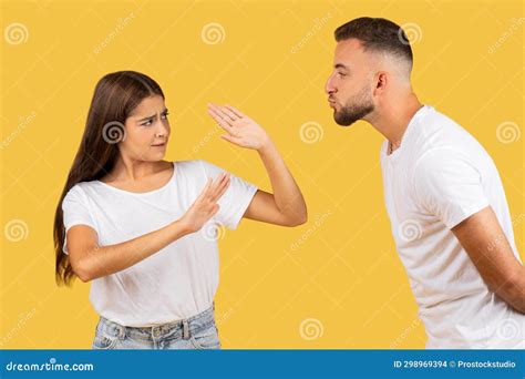 Sad Millennial European Woman With Smartphone Ignores Offended Angry