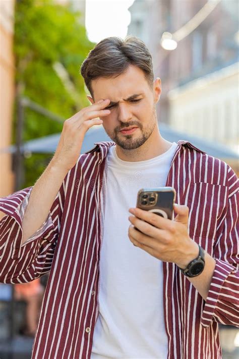 Surprised Handsome Man Use Smartphone Loses Bad News Fortune Loss