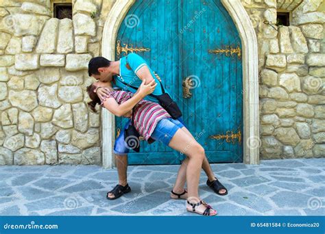 Man Gentle Tilted His Girlfriend Holding Her In His Arms And