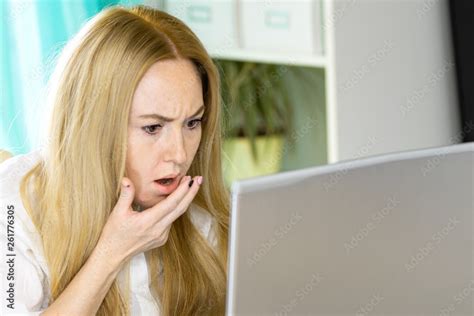 Portrait Young Shocked Business Woman Sitting In Front Of Laptop