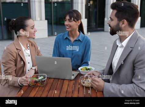 Business Lunch Happy Colleagues With Laptop Spending Time Together At