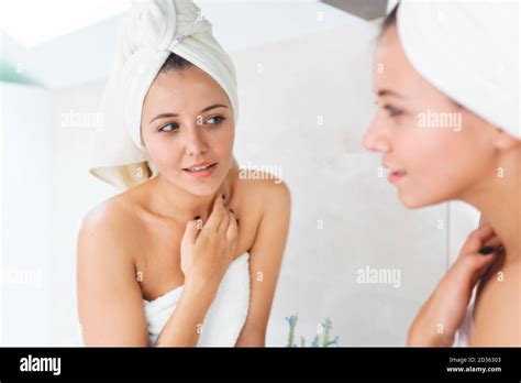 Young Attractive Woman With White Towel On Head And Body With