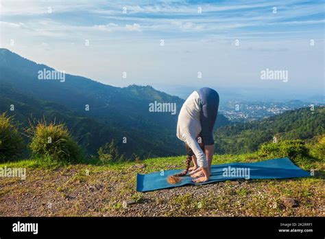 Young Sporty Fit Woman Doing Yoga Sun Salutation Surya Namaskar Stock