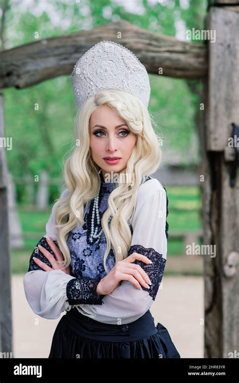 Stylish Russian Female In Traditional National Folk Dress Sundress And