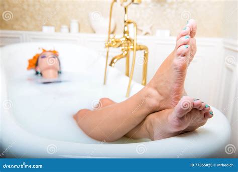 Woman Legs Lying In White Bathtub Stock Image Image Of Hygiene