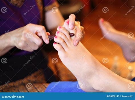 Reflexology Foot Massage Spa Foot Treatment By Wood Stick Stock Image