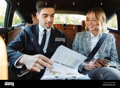 Image Of Young Caucasian Businesslike Man And Woman In Formal Wear