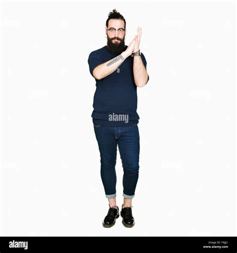 Young Hipster Man With Long Hair And Beard Wearing Glasses Clapping And