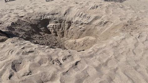 Nags Head Officials Urge Beachgoers To Avoid Digging Holes In Sand