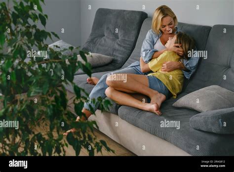 Young Loving Mother Hugging Her Teenage Daughter Mom Demonstrating