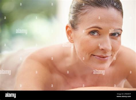 Waiting For Her Masseuse A Woman In A Day Spa Relaxing On A Massage