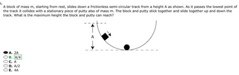 solved a block of mass m starting from rest slides down