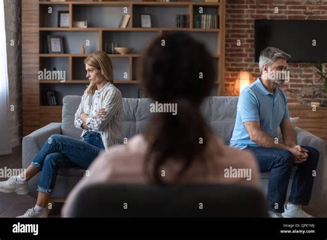 Offended Angry Adult Caucasian Man Ignores Woman At Meeting With Black