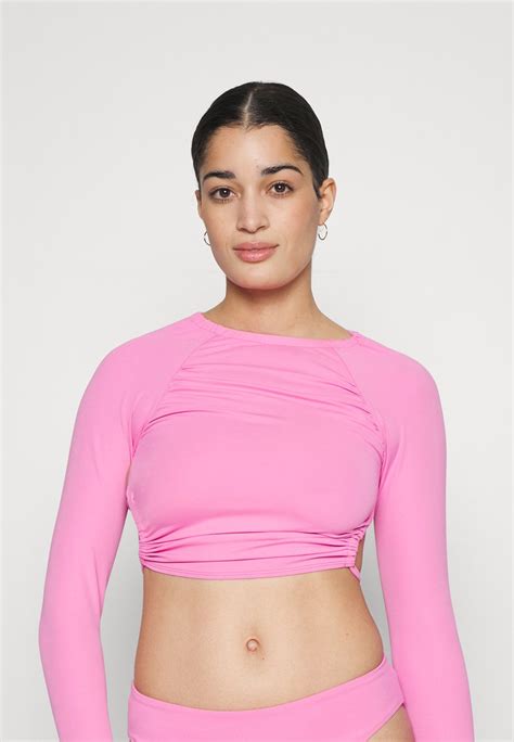 We Are We Wear Eco Layla Long Sleeve Swim Top With Lace Up Back Haut