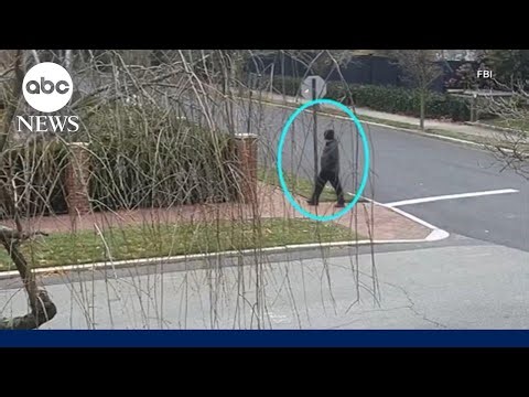 FBI video shows man sought in Brown University shooting near police after attack