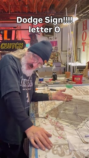 Kory Sherer on Instagram: "Working on an old Dodge Sign this is the last part of the letter O full videos, 24 minutes on Facebook and YouTube. #teacher #handmade #art"
