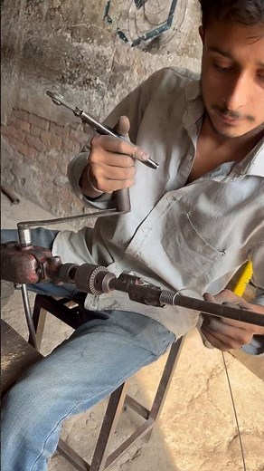 How a skilled worker makes tension spring by hand #shorts #springmaking