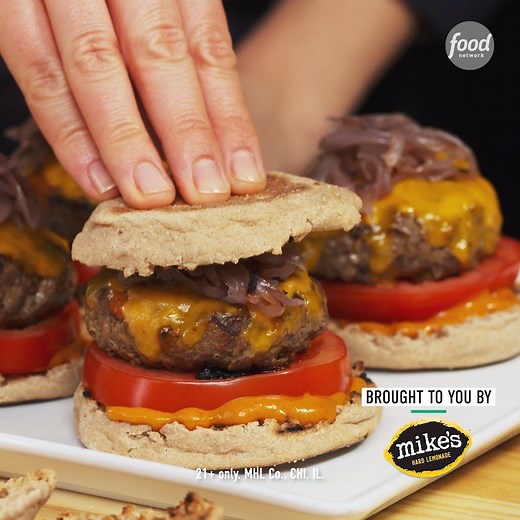Grilled Juicy Cheeseburgers will never let you down! 🍔 (For 21 !) Get the recipe: https://foodtv.com/3b9Qp40 | Food Network