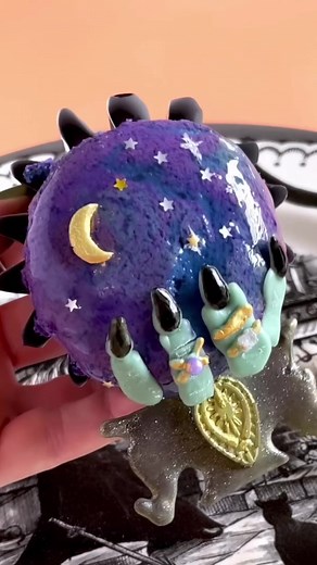 How about that shine! Witchy crystal ball cupcake. #cupcakedecorating #witchythings #minicupcakes #halloweenideas #cakedecorating #spookyseason #crystalball | Sophia Mya Cupcakes