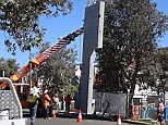Crane lifts a structure in place at Guy Sebastian's Maroubra home