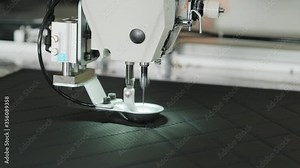 Closeup of sewing machine working part with leather. Cnc sewing machine