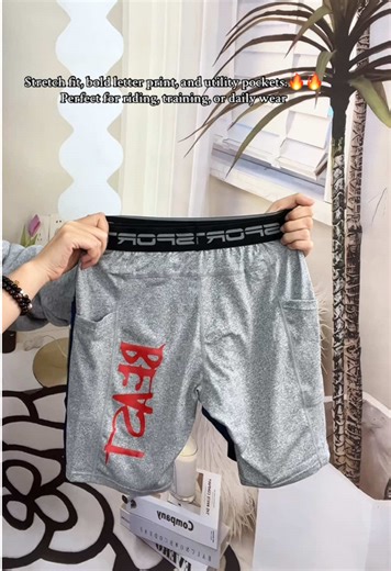 Stretch fit, bold letter print, and utility pockets. Perfect for riding, training, or daily wear#traininggear #athleticshorts #streetfitness #mensfashion #workoutshorts