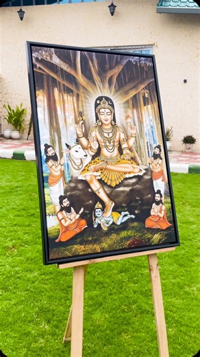 Introducing “Floating Frames” for gallery wrap canvas. That is, the canvas appears suspended within the frame without touching any of the sides, adding a dimensional effect with visual impact. DM us to order. In video, is 20x30 inch print of shiva as Dakshinamurthy on gallery wrap canvas with floating frame . . #mahadev #harharmahadev #mahakal #hinduism #shiv #krishna #kedarnath #omnamahshivaya #lordshiva #mahakaal #shivshakti #mahakaleshwar #guru #shiva #dakshinamurthy #canvasprintsforsale #flo
