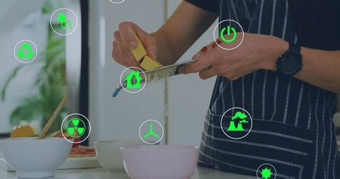 clip-3997720255-teen-male-grating-yellow-piece-making-food