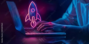 Person typing on a laptop with a glowing neon rocket icon on the screen representing digital innovation and progress, tech advancement, neon light, creative ideas
