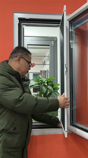 Extremely narrow exterior window with inward-opening screen, does not take up space.