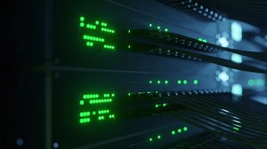 clip-1092703487-close-up-view-modern-internet-network-switch-plugged