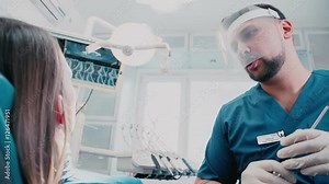 The patient is in the dental chair ready for inspection. Routine inspection of the oral cavity. Prevention of dental diseases. Toothache. Dental treatment. stomatology