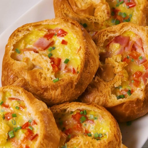 These Croissant Breakfast Boats have literally everything you've ever wanted. Full recipe: http://dlsh.it/5s8YkOX | Delish