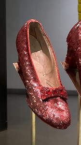 202K views · 5.4K reactions | An original pair of glittery ruby red slippers worn by Hollywood actress Judy Garland in the 1939 movie "The Wizard of Oz" is on display in London before they go under the hammer in the US. The slippers, one of only four surviving pairs made for the film, were worn in several iconic scenes. #AFP  Maya SZANIECKI #WizardofOz #Dorothy | AFP News Agency | Facebook