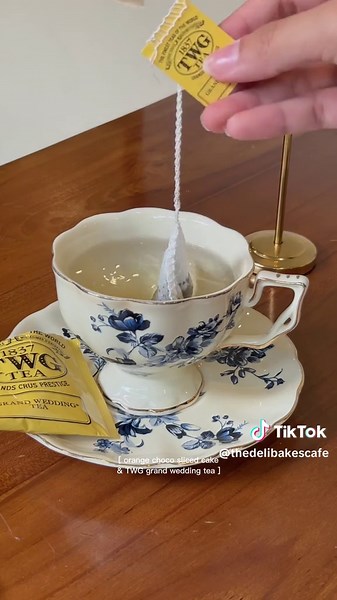 — a decadent orange choco cake with a light fruity twg grand wedding tea✨ #thedelibakes #orangechococake