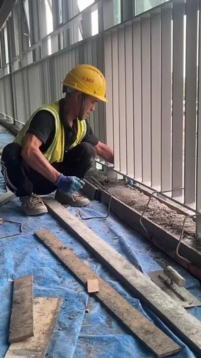 Fit the baseboard along the bottom of the wall Secure the baseboard with nails or adhesive