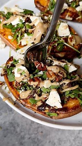 SWEET POTATO BOATS WITH PECAN-FETA-DATE CRUMBLE! Using my favorite crumble ever & topping off these sweet potato boats for the most epic side dish! Perfect for the holiday 🫶 • For the crumble: 1/2 cup raw pecans 5-6 dates 2 oz feta cheese Handful arugula 1/2 tsp salt 1/2 tsp pepper Zest of 1/2 lemon • For the sweet potatoes: 4 medium sweet potatoes, halved 1 head garlic, top sliced off 2 tsp cumin 1 1/2 tsp dried oregano 1/2 tsp salt 1/2 tsp pepper 5 tbsp, plus more for garlic, olive or avocado