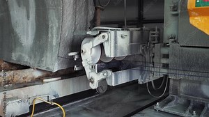 Heavy Saw Machinery Cutting Granite Slab At Industrial Production Line. Cutting Granite Slab By Modern Heavy Saw Machinery And Diamond Wires. Heavy Saw Machinery With Diamond Wire Cutting Equipment