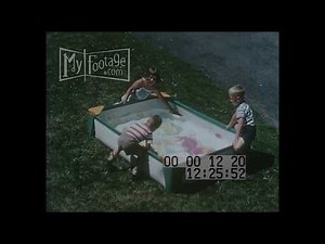 1950s Kids Playing in a Swimming Pool