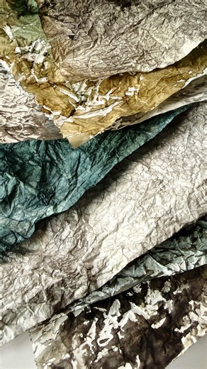 Debasree Dey - Mixed Media Art Journaling on Instagram: "I was experimenting again — you know how much I love texture! ✨ This time I played with the Momigami technique and some acrylic colors, and ended up creating these beautifully grungy, textured papers. Can you guess what kind of paper I used for this? 😉 (Hint: it’s something we all have lying around the house!) Perfect for collage, junk journaling, or adding texture to any mixed media project. #momigamitechnique #texturedpaper #collagepape