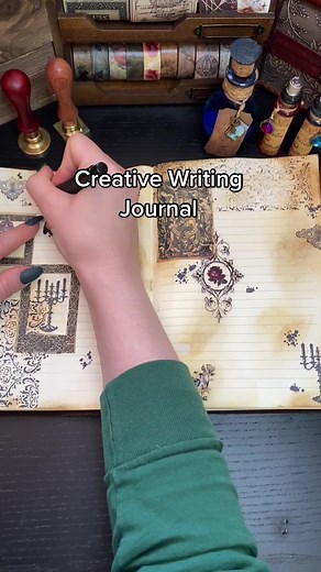 Decorated some pages in my creative writing journal. I find it helps give me inspiration for my stories. To make these pages I used:- Victorian Gothic Clear Stamps- Renaissance Washi Tape- Victorian Gothic Sticker sheet- Background Stamps- Chandelier Stamp- Dark Garden Transfer StickersAll from @coracreacrafts - use the code BOOKWORM15 for 15% off your order.#JournalIdeas #Journaling #Stamps #JournalASMR #ASMRSounds #Calming #Scrapbook #VintageJournal #CreativeWriting