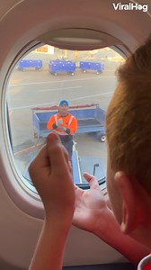 A kid plays "rock, paper, scissors" with a Southwest Airlines employee loading luggage. #viralhog #southwestairlines #rockpaperscissors | ViralHog